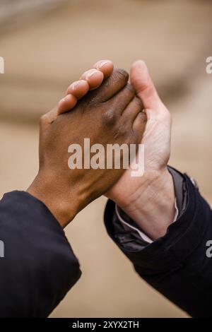 Two friends high-fiving each other Stock Photo - Alamy