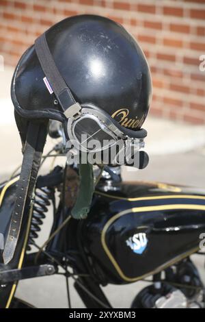 Vintage crash helmet and protective goggles on motorcycle seat Stock ...