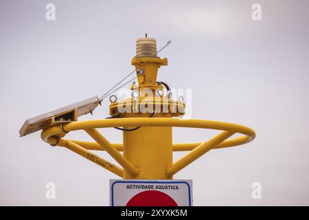 Yellow mast with traffic sign Stock Photo - Alamy