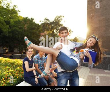 Group of college students during a brake between classes - chatting and ...