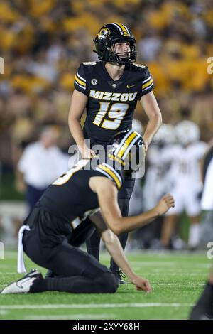 Missouri place-kicker Blake Craig (19) celebrates a 56 yard field goal ...