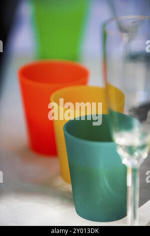 Disposable colored plastic cups garbage. Garbage and pollution concept ...