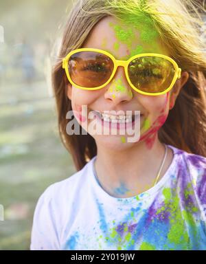 Kids celebrate holi with color, happy holi. Children with colored ...