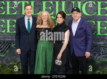 Miles Millar, left, and Alfred Gough pose for photographers upon ...