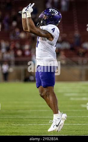 TCU running back Cam Cook (4) carries the ball during an NCAA college ...