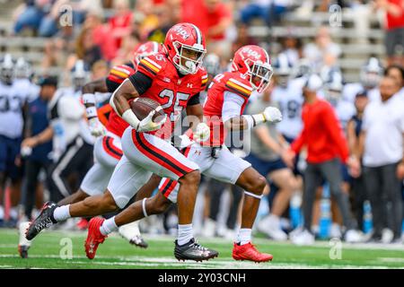 Maryland running back Nolan Ray (2) is tackled by Nebraska linebacker ...
