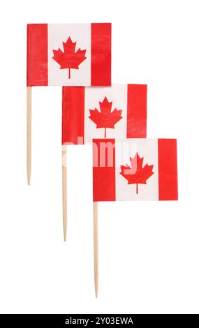 Small paper flags of Canada isolated on white Stock Photo - Alamy