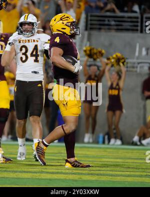 Arizona State running back Cam Skattebo (4) scores a touchdown in ...