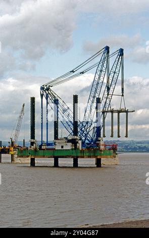 Lampson Translift crane on its jack up with the caisson lifting rig on ...