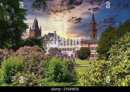 Weinheim castle park Old Town view during sunset with sun flare, hessen ...