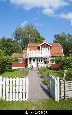 wooden gates and green yard in holiday village Stock Photo - Alamy