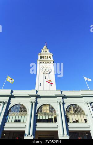 A low angle shot of a clock on a tower Stock Photo - Alamy
