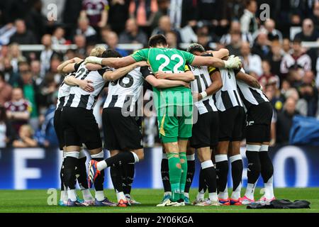 Newcastle United players huddle ahead of the Premier League match at ...