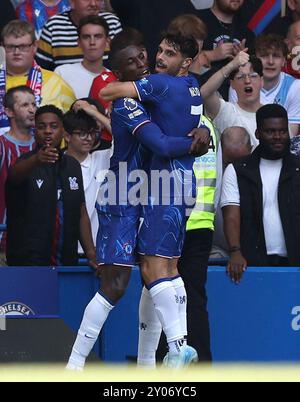 Chelsea's Pedro Neto, left, celebrates with team mate Chelsea's Enzo ...
