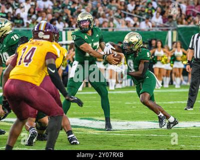 South Florida quarterback Byrum Brown (17) rushes with the ball during ...