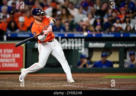 Houston Astros' Yainer Diaz singles during the first inning of a spring ...
