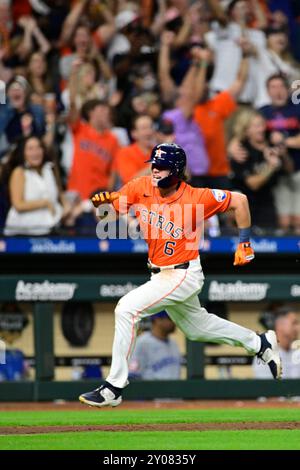 Houston Astros' Jake Meyers scores on a hit by Jeremy Peña during the ...