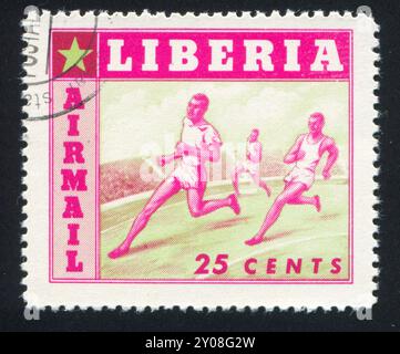 LIBERIA - CIRCA 1955: a stamp printed in the Liberia shows Running, Sport, circa 1955 Stock ...