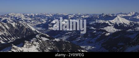 Distant view of Gstaad and snow covered mountains Stock Photo - Alamy
