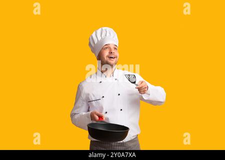 Chef Guy Holding Pan Throwing Invisible Food Standing, Studio Shot ...