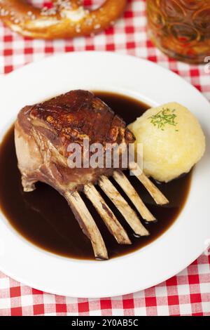 Roast suckling pig with dumplings Stock Photo - Alamy