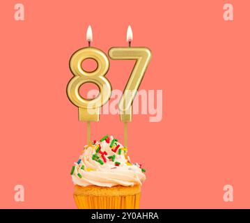 birthday cake with number 87 - cupcake on orange background with ...