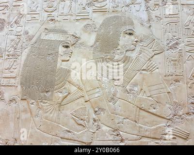 Exquisite wall relief of the noble man Ramose and his wife Merit-Ptah in amarna style in the ...