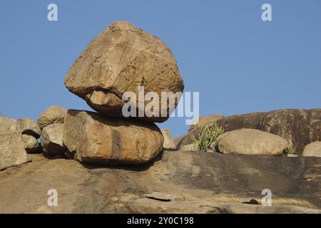 Big balancing granite boulder Stock Photo - Alamy