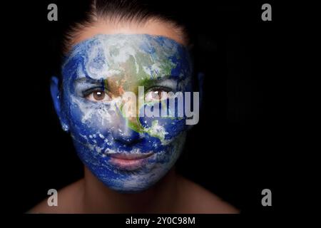 Human face with painted map of world Stock Photo - Alamy