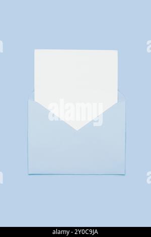 Envelopes with blank card on color background Stock Photo - Alamy