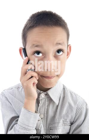 A young boy talks on the cellphone Stock Photo - Alamy