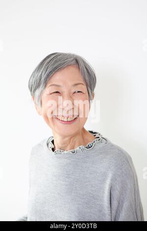 A senior woman's smiling face Stock Photo - Alamy