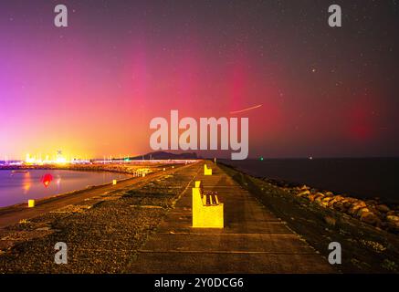 A faint display of aurora borealis at Howth East Pier Stock Photo - Alamy