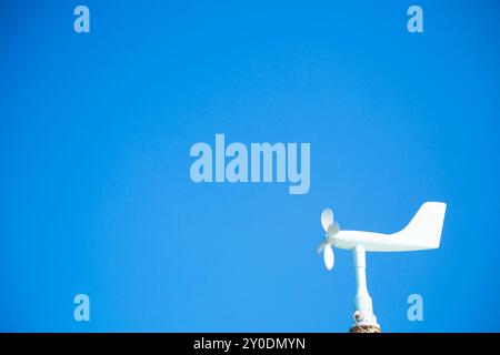 Blue sky and the wind speed anemoscope Stock Photo - Alamy