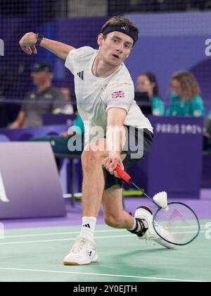 Daniel Bethell in action during the Badminton Men's gold medal match ...