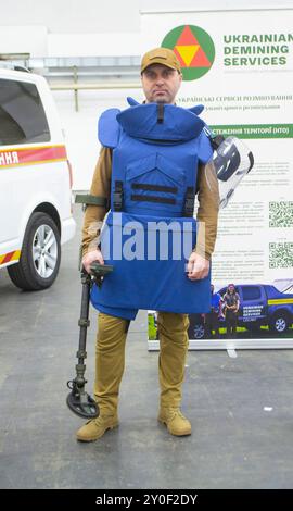 Kyiv, Ukraine, May 28, 2024: Men standing in mine clearance uniform ...