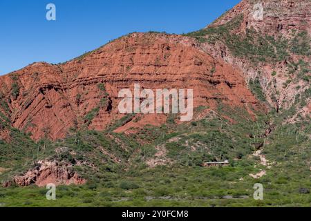 A small house in the scenic Quebrada de Escoipe, Valle de Lerma near ...