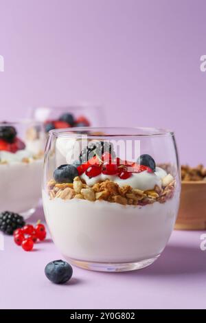 Fresh and yummy strawberry on violet background Stock Photo - Alamy