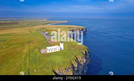 Duncansby Head Lighthouse in late summer the cliffs of the most ...