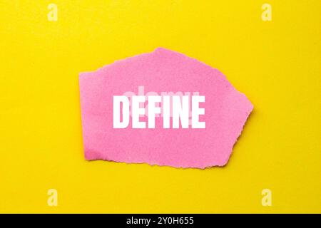 Define message written on ripped torn paper piece with pink background ...