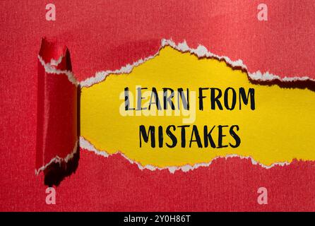 Learn from mistakes message written on wooden blocks with yellow ...