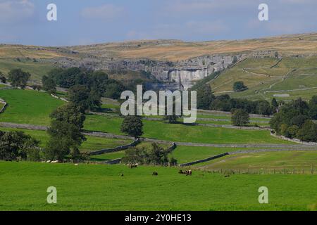 A view of Malham Cove as you enter the village of Malham in North ...