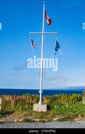 Flags flying at Green Point Lighthouse in Port de Grave, Newfoundland ...