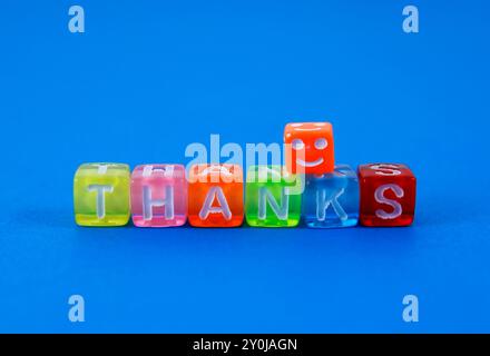 Colorful blocks that form the word thanks Stock Photo - Alamy