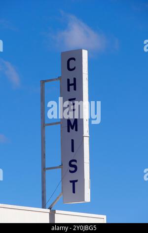 Chemist sign and blue sky, Western Australia Stock Photo - Alamy
