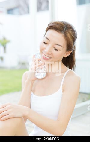 Diet and Drinking Water. Woman with bottle of water Stock Photo - Alamy