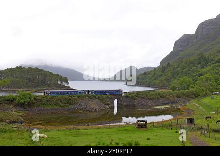 Scotrail Inverness to Kyle train service approaching Plockton alongside ...