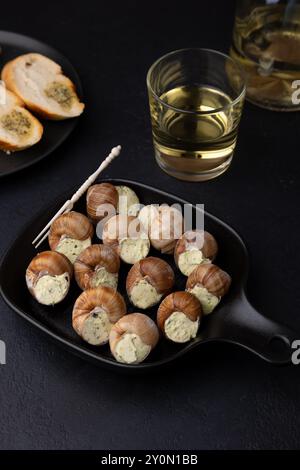 French cuisine - Escargot with butter sauce Stock Photo - Alamy