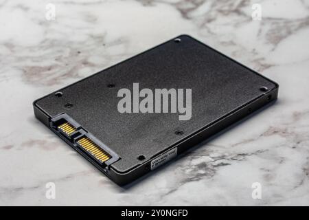 SATA SSD solid state drive shown from above, isolated on a white ...