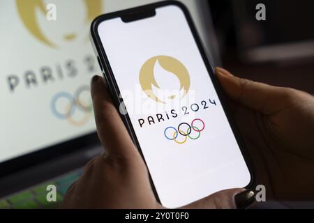 In this photo illustration, the Paris 2024 Olympics logo is seen on a ...